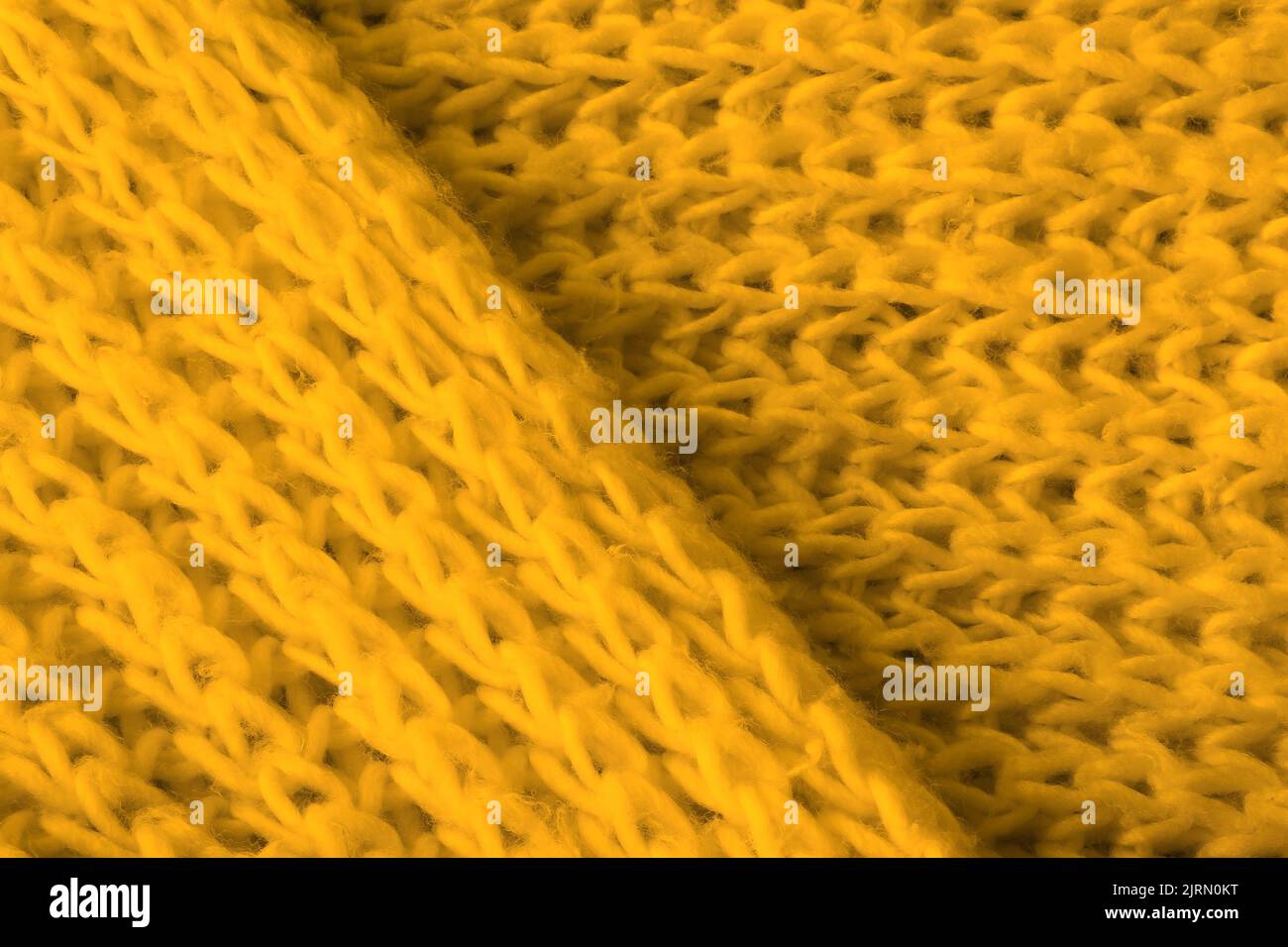 Texture of soft yellow knitted fabric as background. Banner for design ...