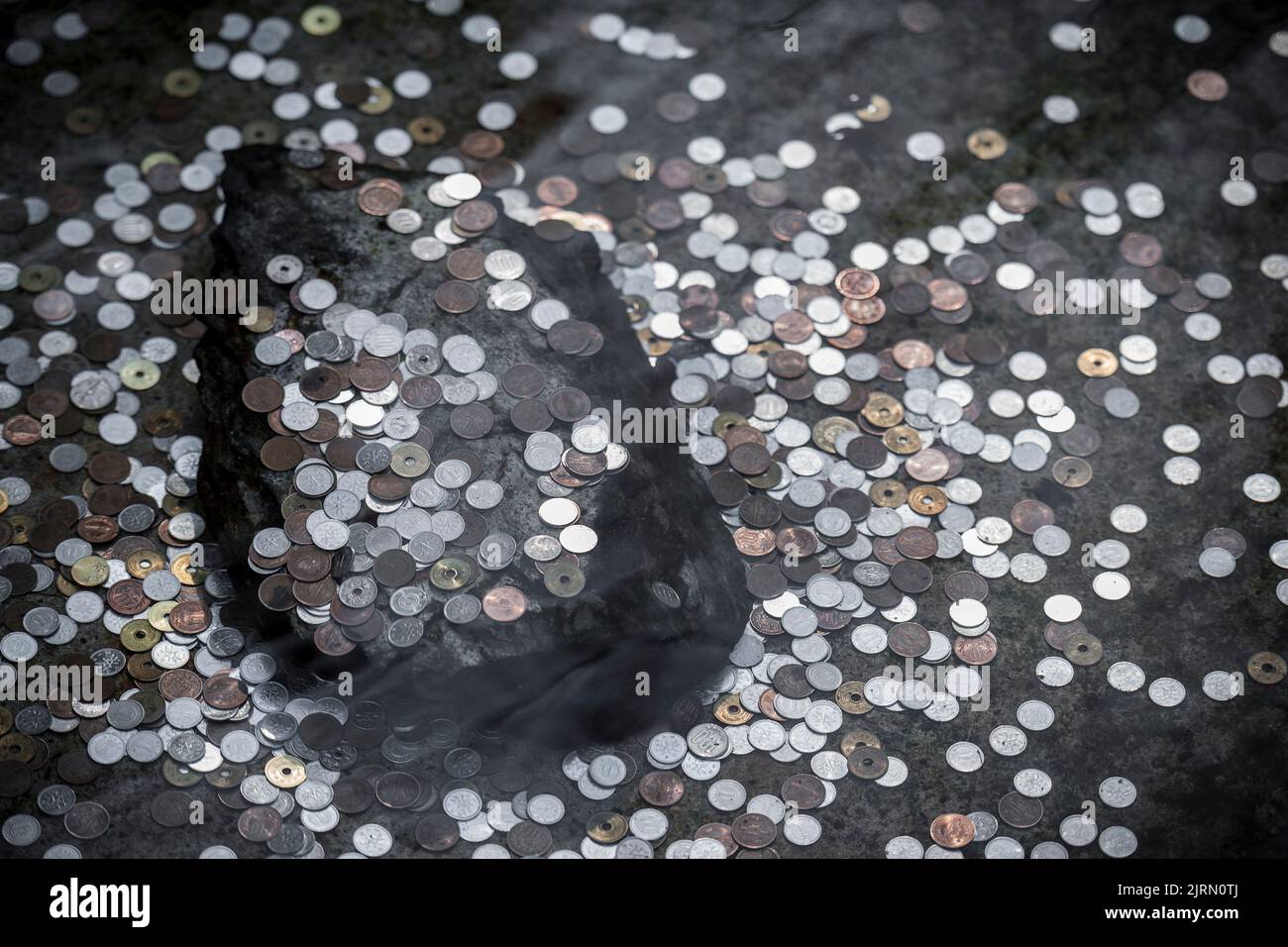 Silver coins scattered on hi-res stock photography and images - Alamy