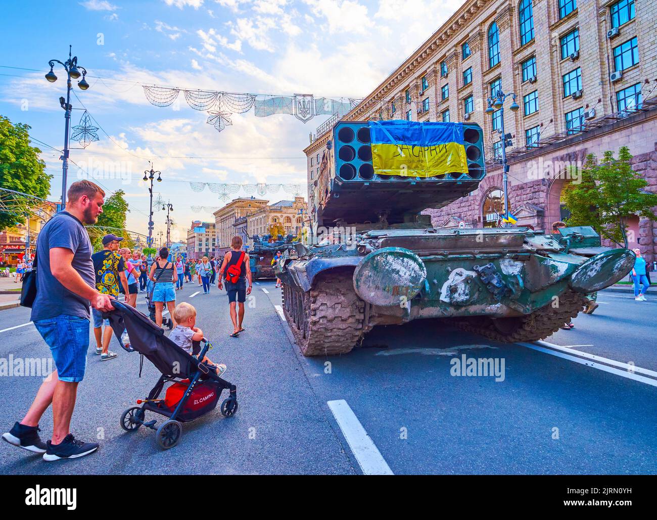 KYIV, UKRAINE - AUGUST 23, 2022: Ukrainian flag atop destroyed Russian ...