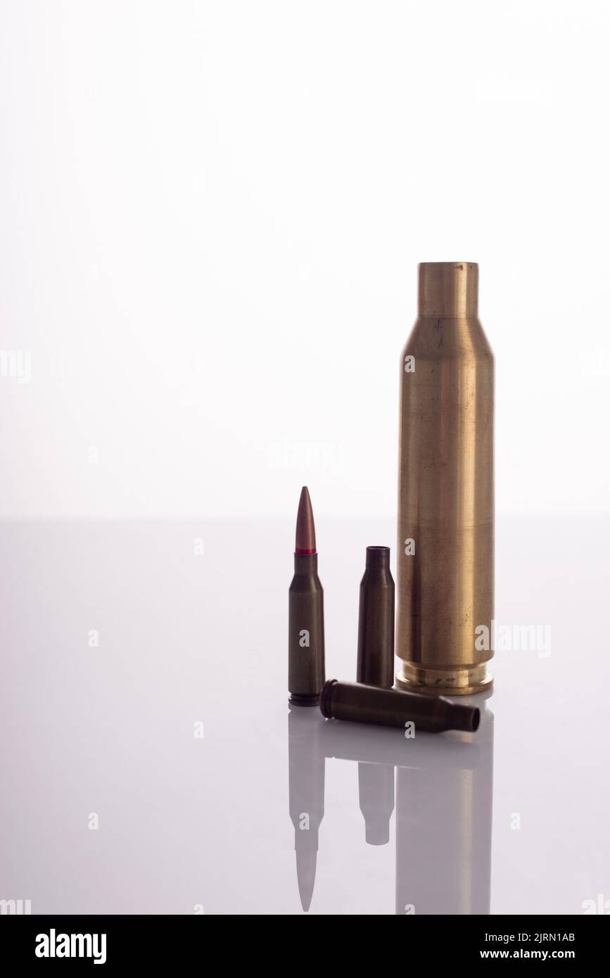 used spent shells of cartridges from a machine gun and a machine gun on ...