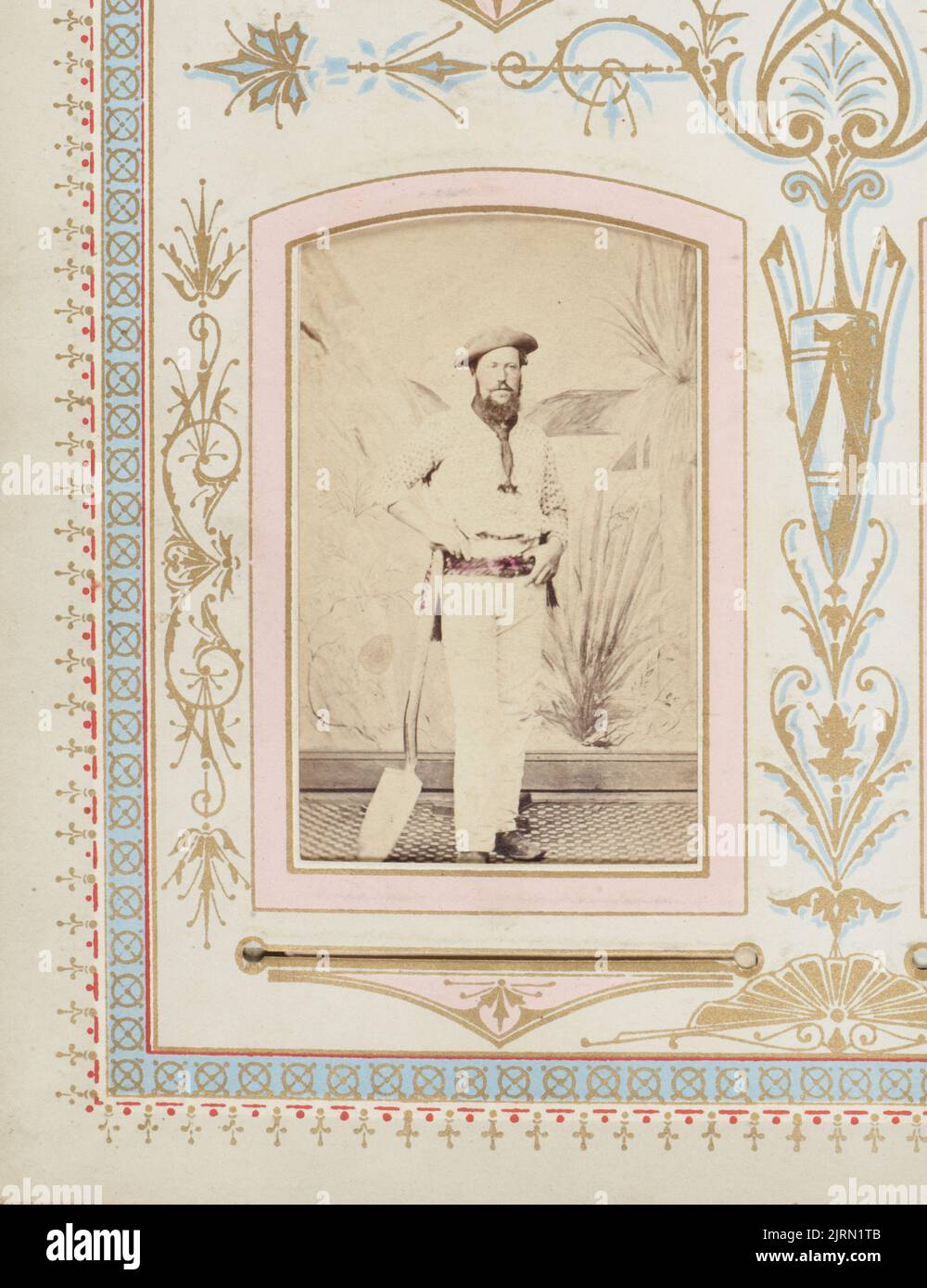 Man standing with a shovel. From the album: The Colonial Family Album ...