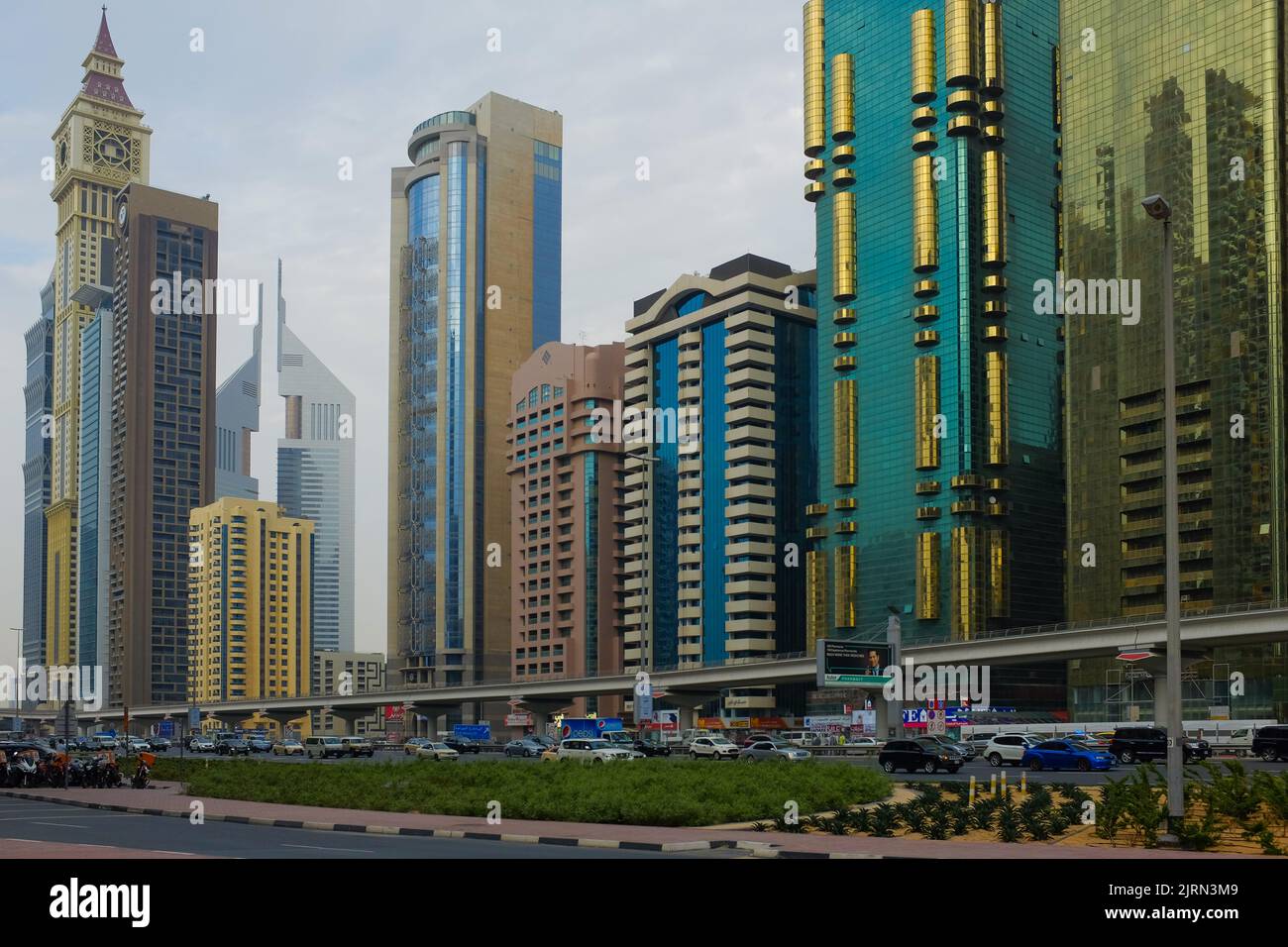 Dubai, United Arab Emirates: Tall buildings and fast cars along Sheikh ...