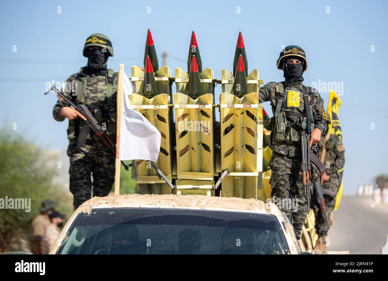 Armed fighters of Al-Quds Brigades, the military wing of Islamic Jihad ...