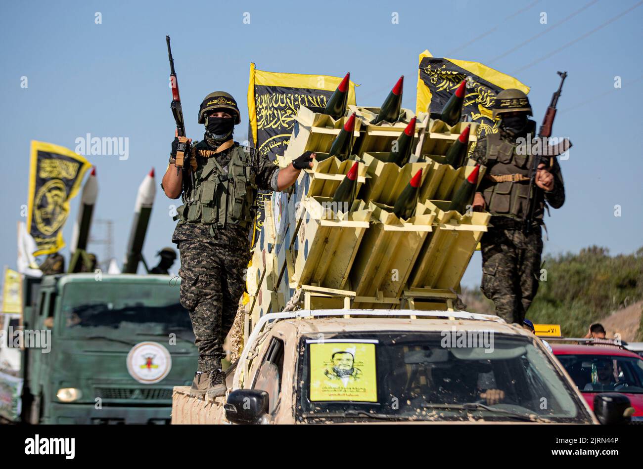 Armed fighters of Al-Quds Brigades, the military wing of Islamic Jihad ...