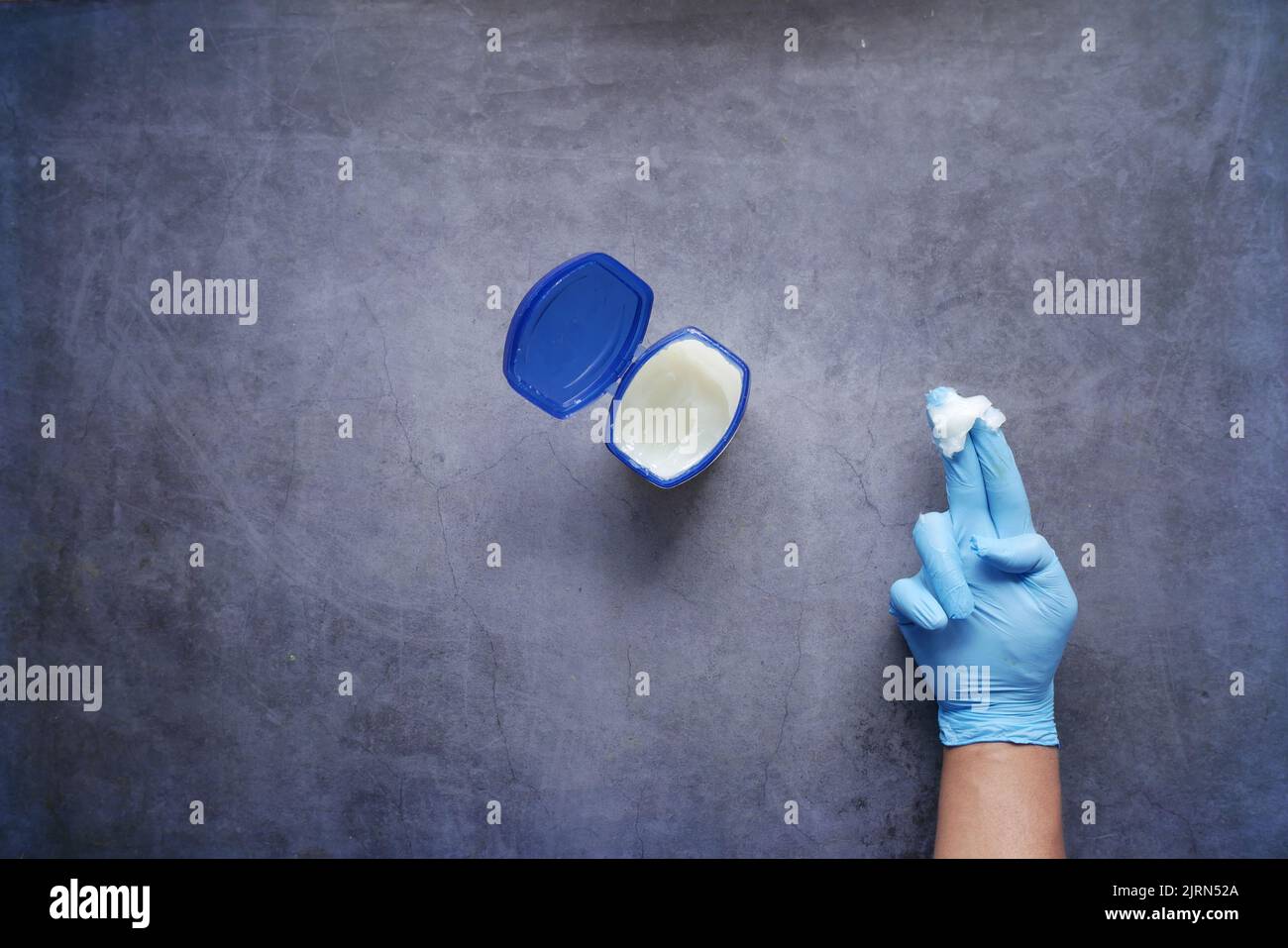 Using gloves prevent hand hi-res stock photography and images - Alamy
