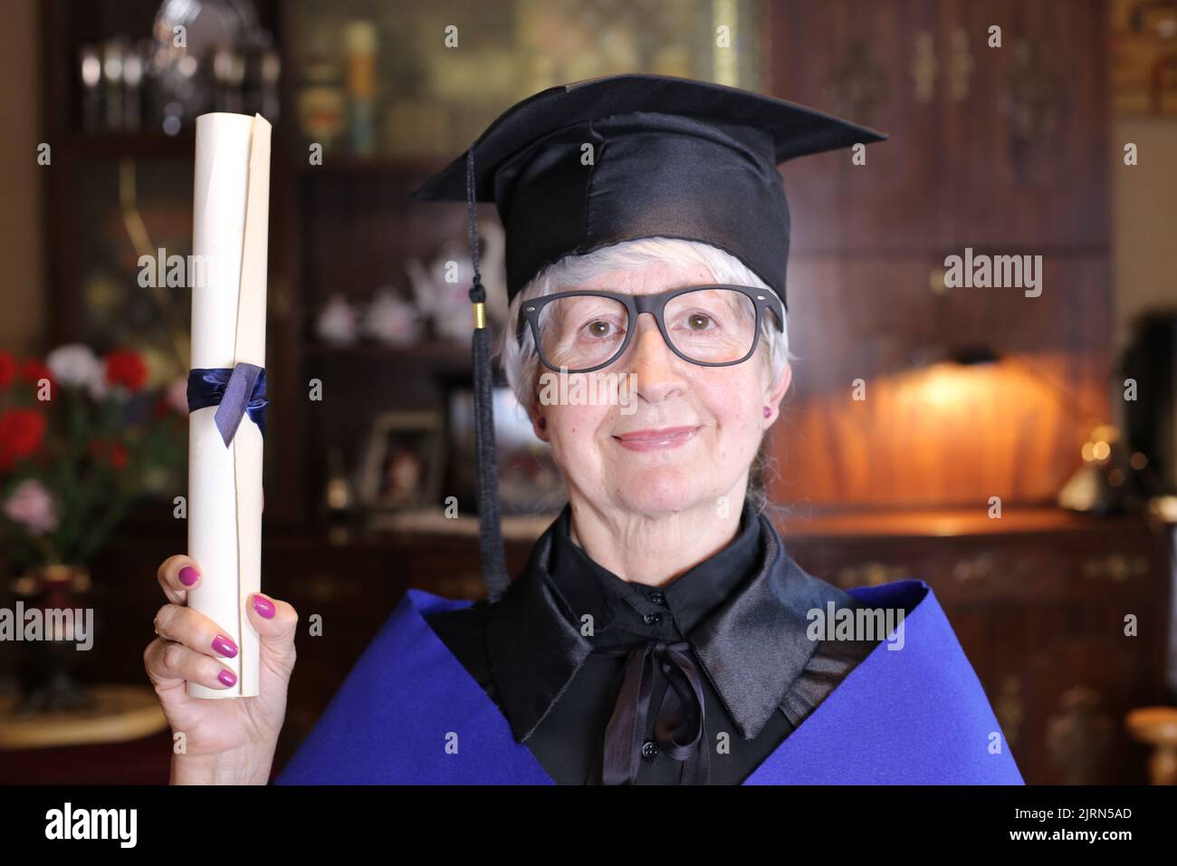 Older student during her graduation day Stock Photo - Alamy