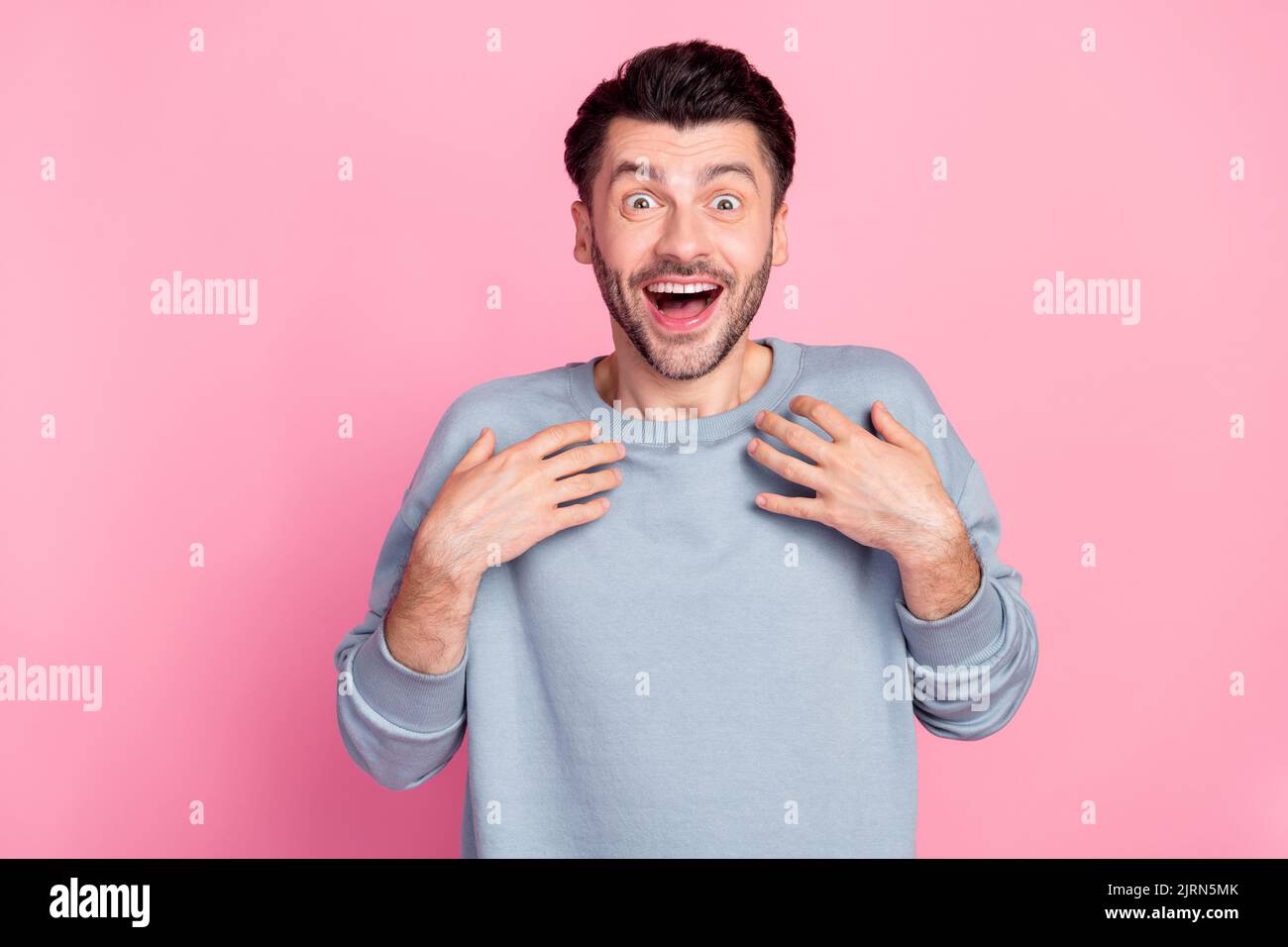Portrait of shocked questioned satisfied person hands touch chest cant ...