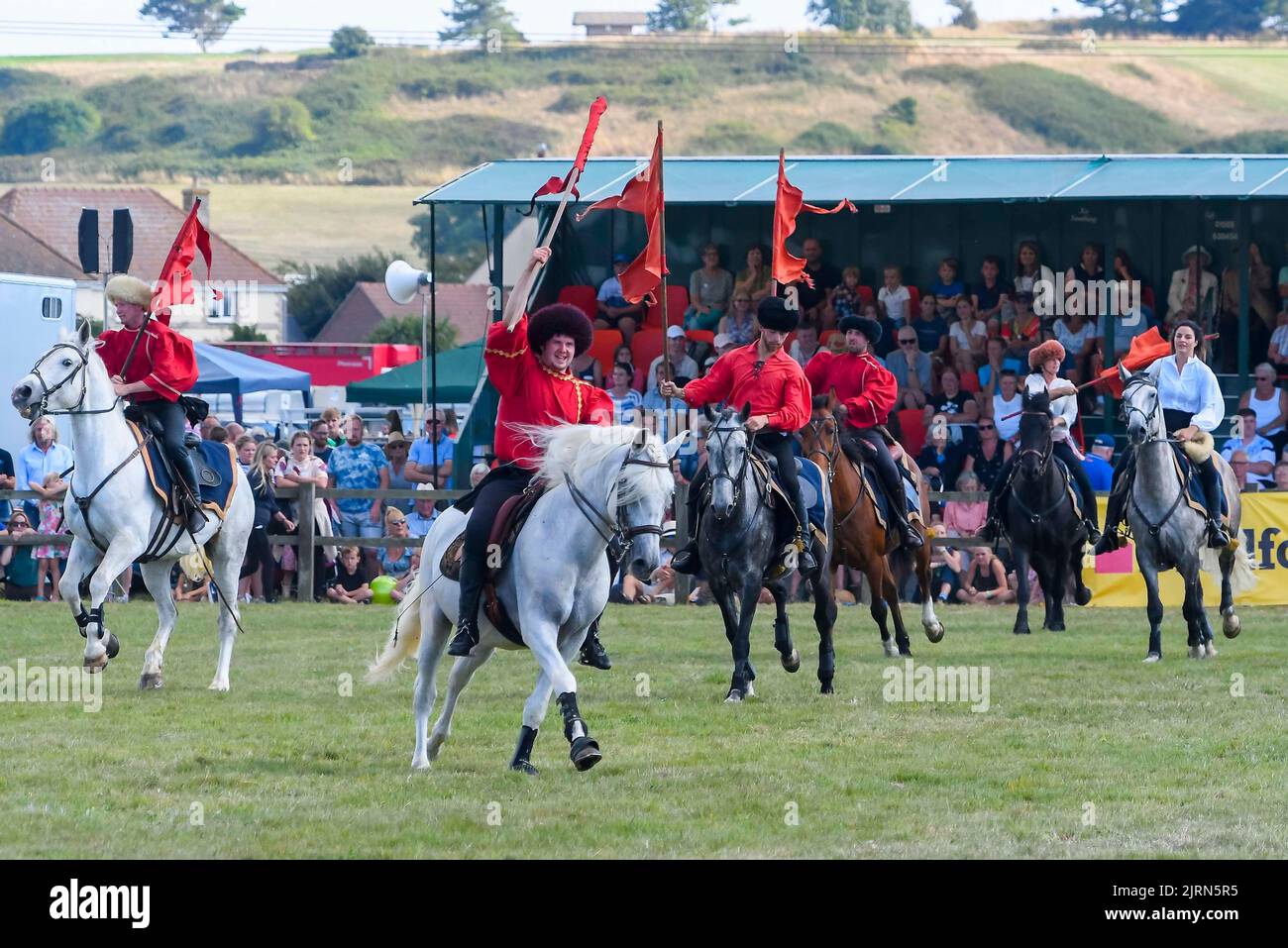 Bridport, Dorset, UK. 25th August 2022. The Devil’s Horsemen performing ...