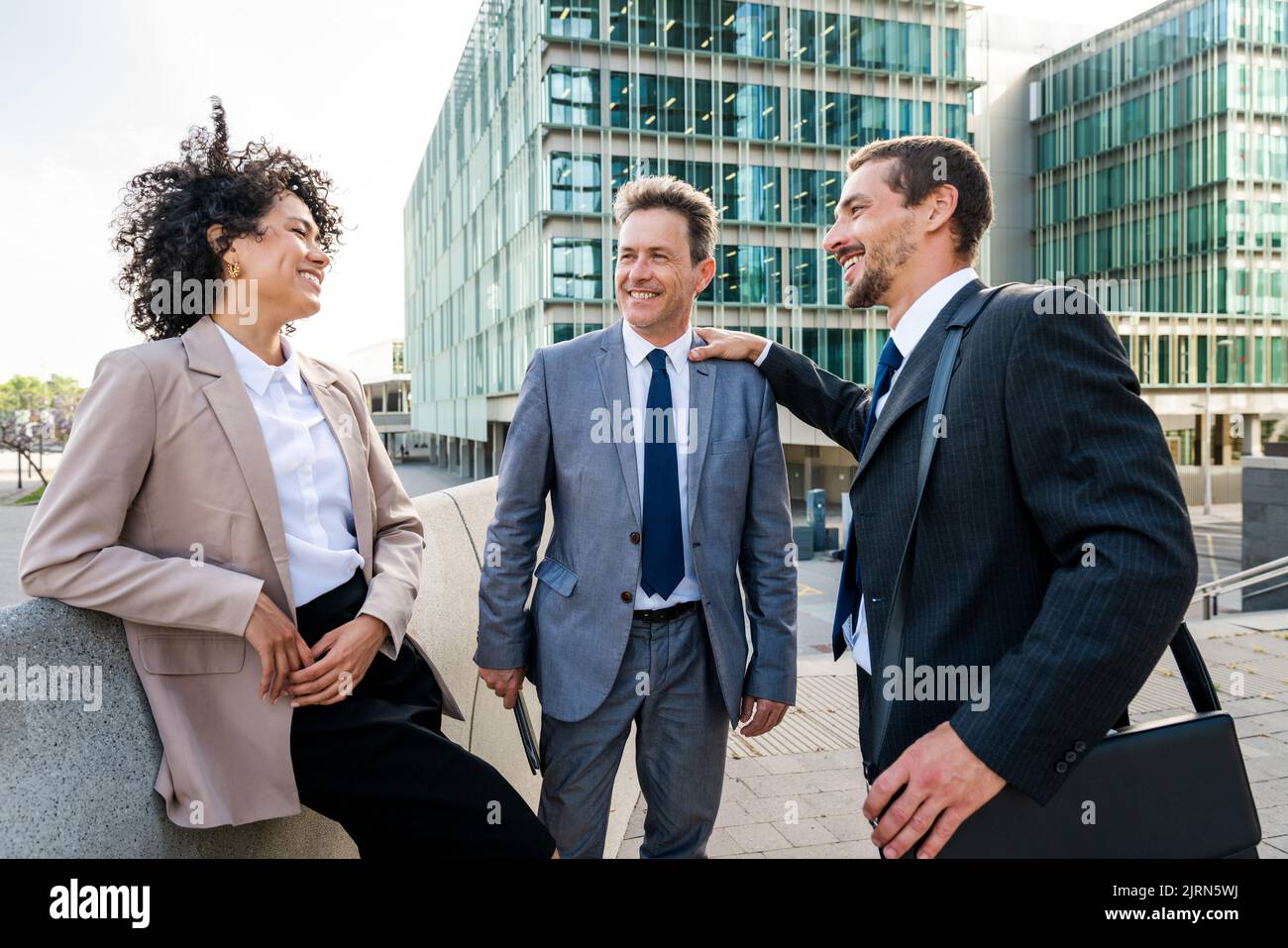 Multiracial group of business people bonding outdoors - International ...