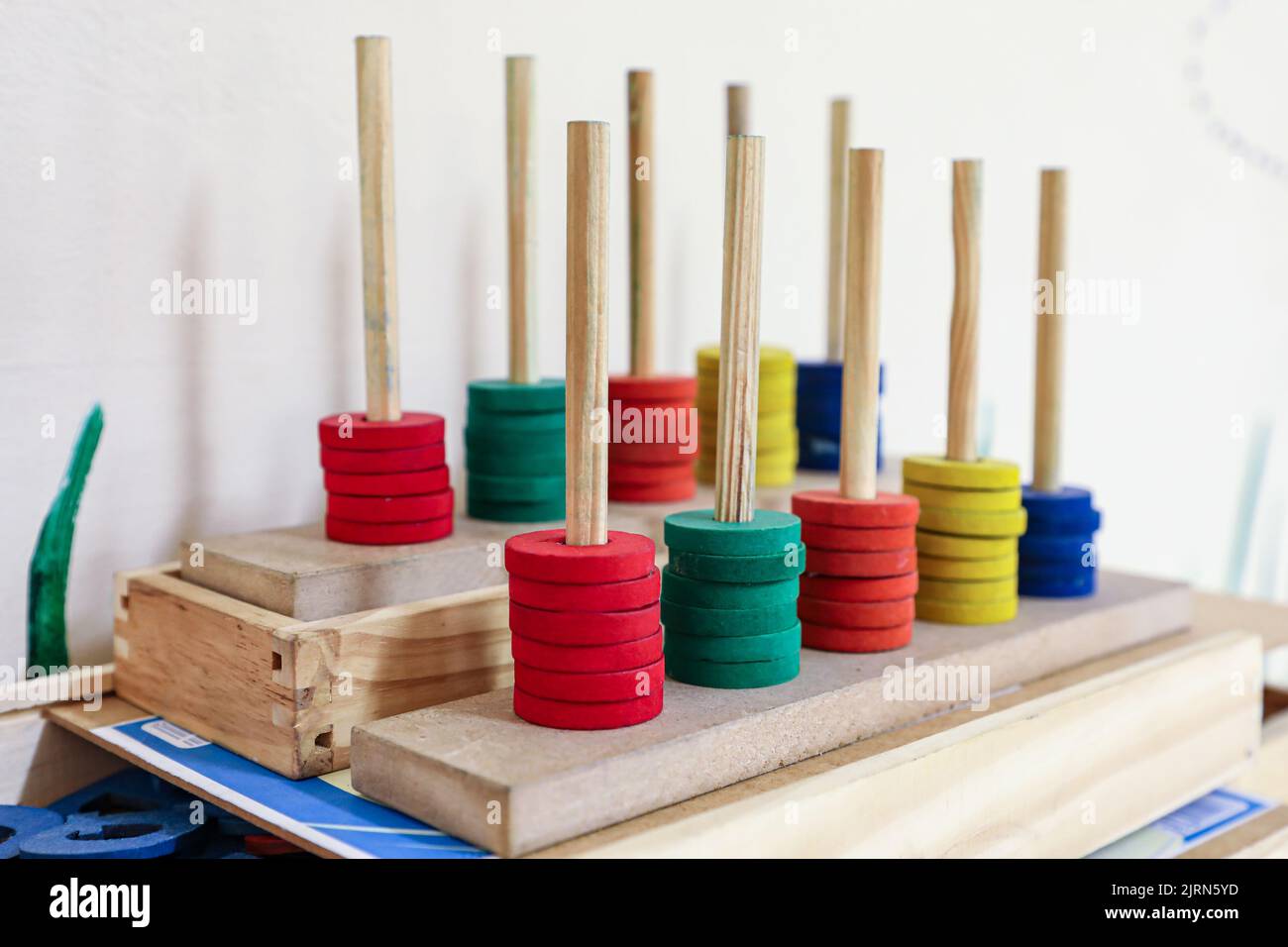 Soroban abacus in wood and colored, with the colors red, green, orange ...