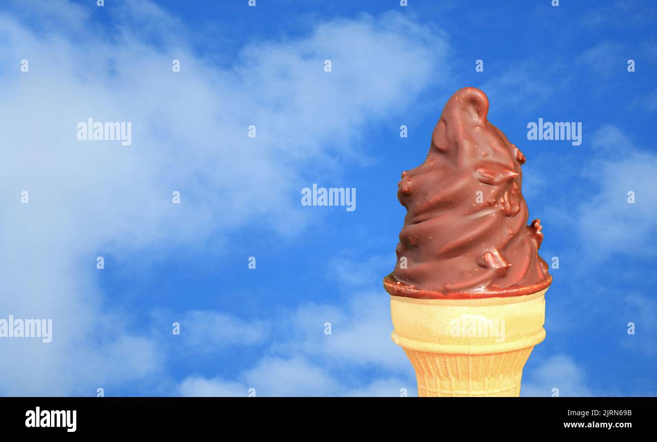 Chocolate Coating Soft Serve Ice Cream Cone on Vibrant Blue Sky ...