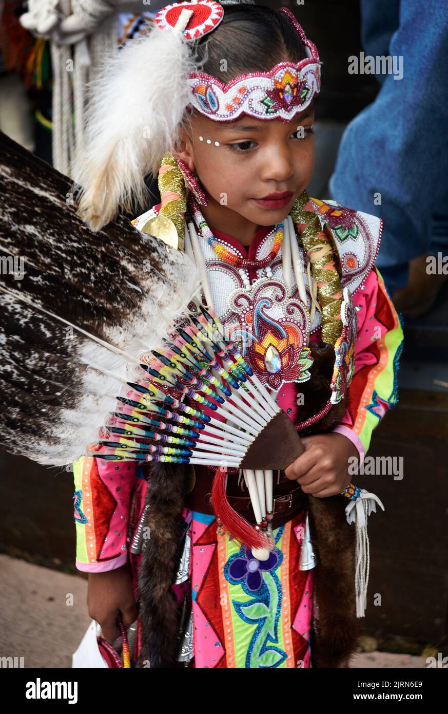A young Native American girls prepares to compete in the Native ...