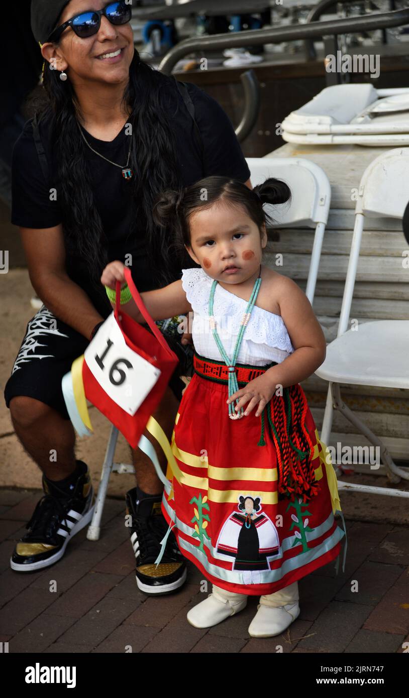 A Native American parent prepares his daughter to compete in the Native ...