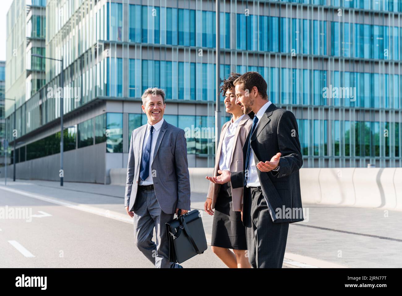 Multiracial group of business people bonding outdoors - International ...