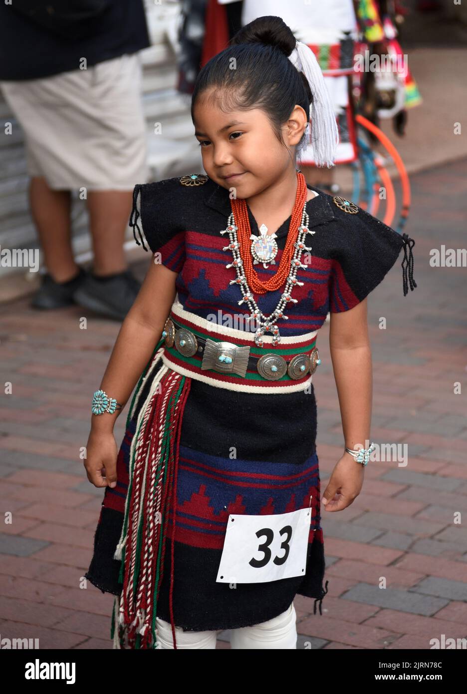A young Native American girl (Navajo) waits her turn to compete in the ...