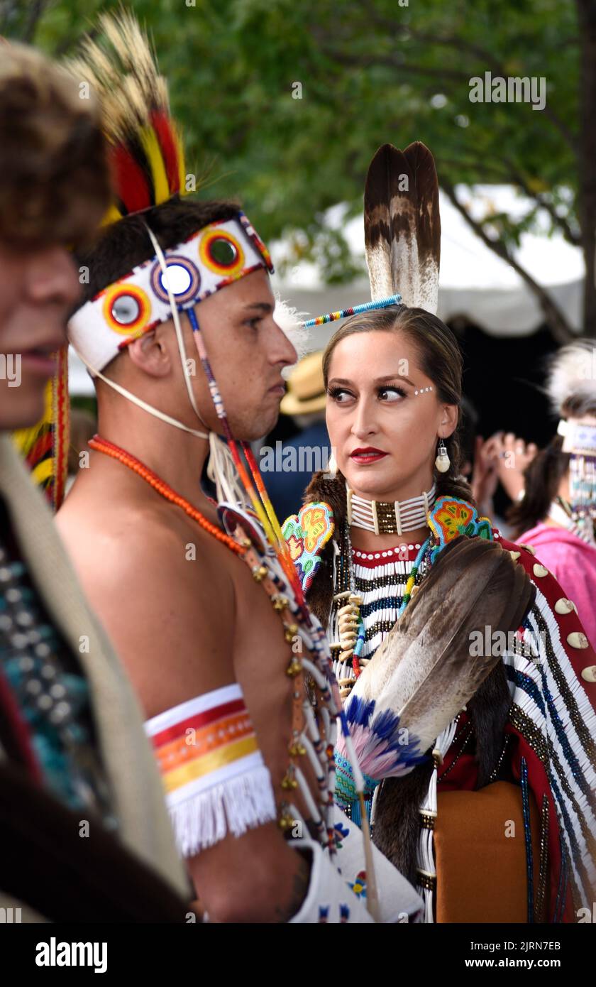 A Native American couple wait to compete in the Native Clothing Contest ...