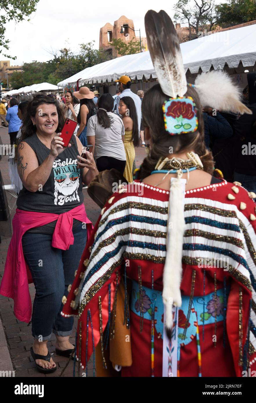 Native Americans pose for photographs at the Santa Fe Indian Market in ...