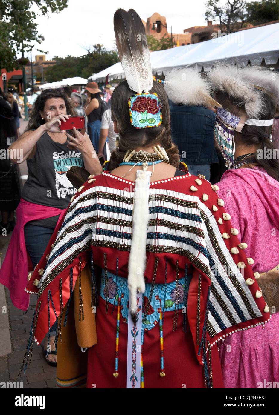 Native Americans pose for photographs at the Santa Fe Indian Market in ...