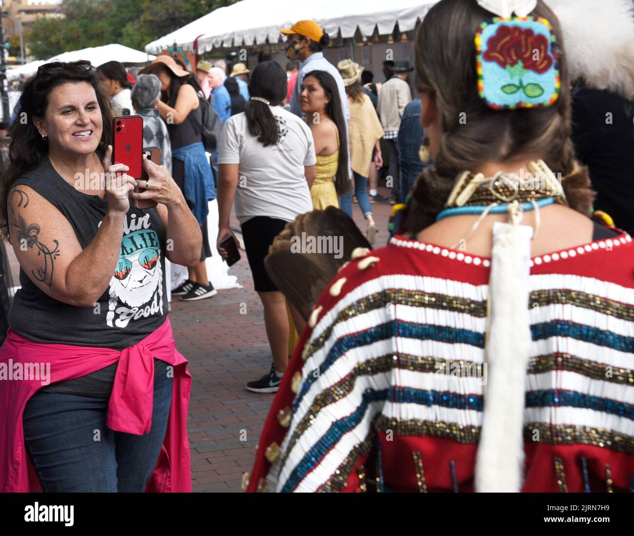Native Americans pose for photographs at the Santa Fe Indian Market in ...