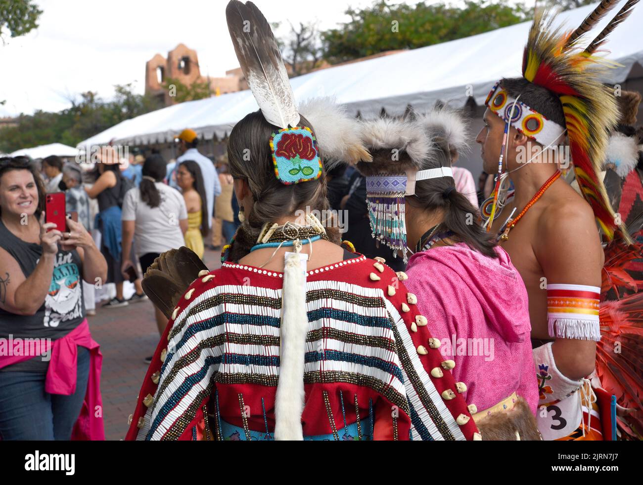 Native Americans pose for photographs at the Santa Fe Indian Market in ...