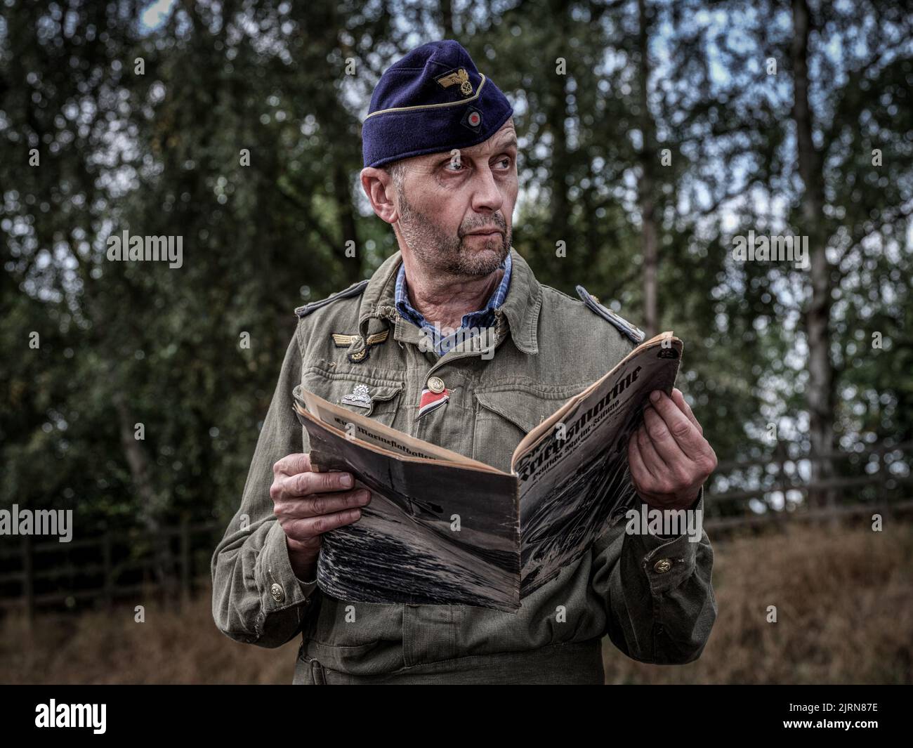 A WW2 reenactor dramatic lighting living history Stock Photo - Alamy