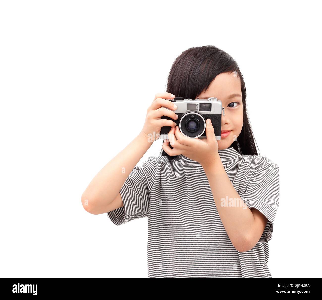 Asian little girl takes picture with vintage camera Stock Photo - Alamy