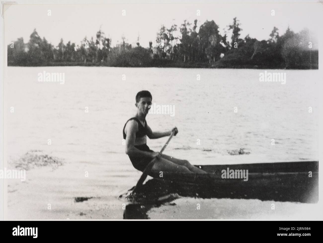 Eric Lee-Johnson in a canoe on the Wanganui River, circa 1920 ...