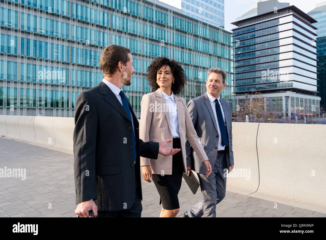 Multiracial group of business people bonding outdoors - International ...