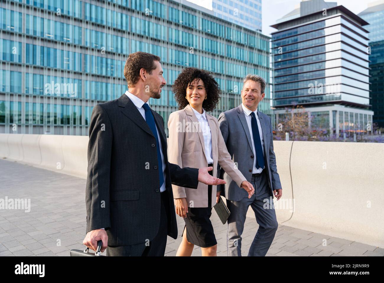 Multiracial group of business people bonding outdoors - International ...
