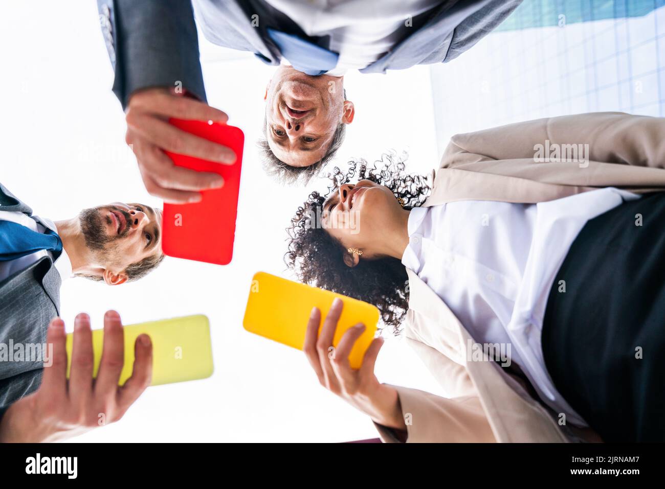 Multiracial group of business people bonding outdoors - International ...