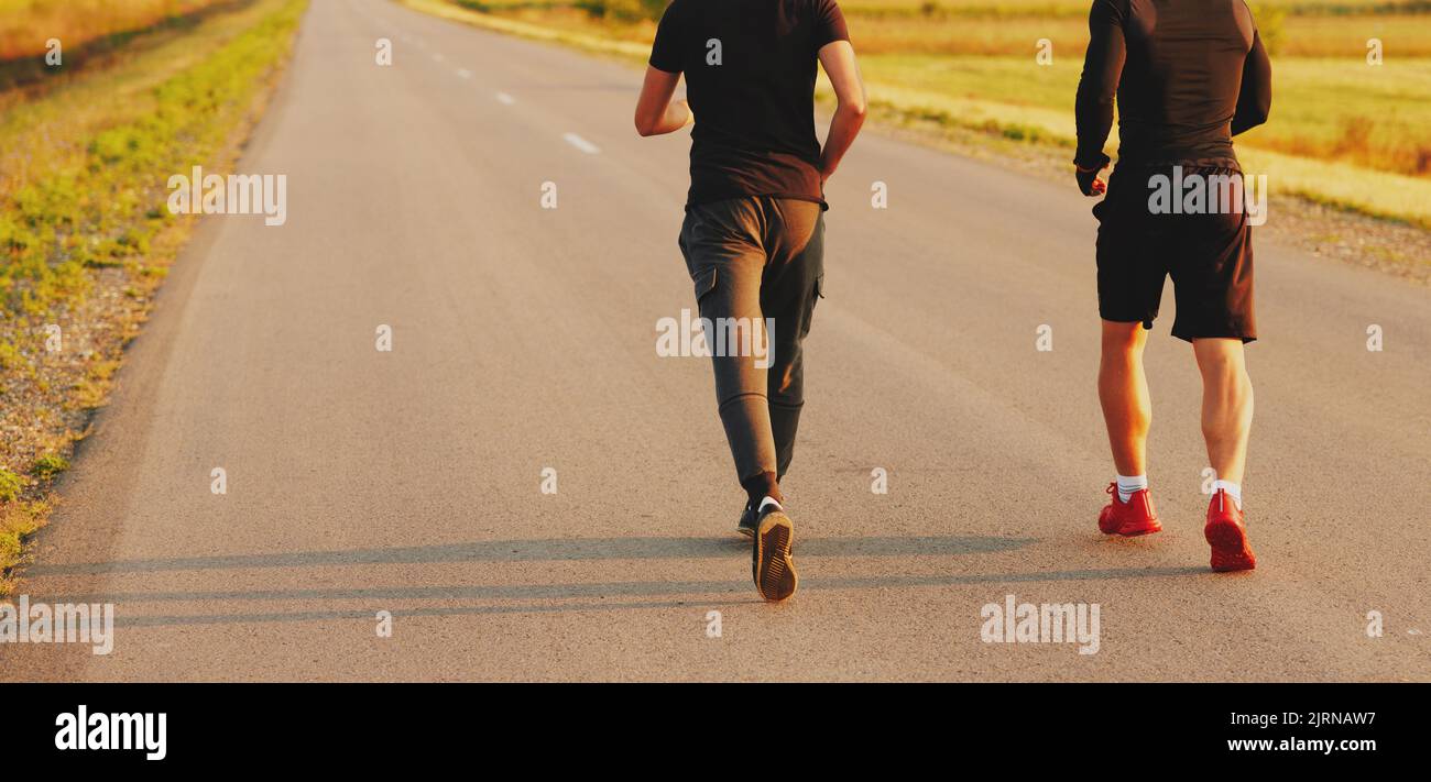 The picture from the back of some young people running, warming up ...