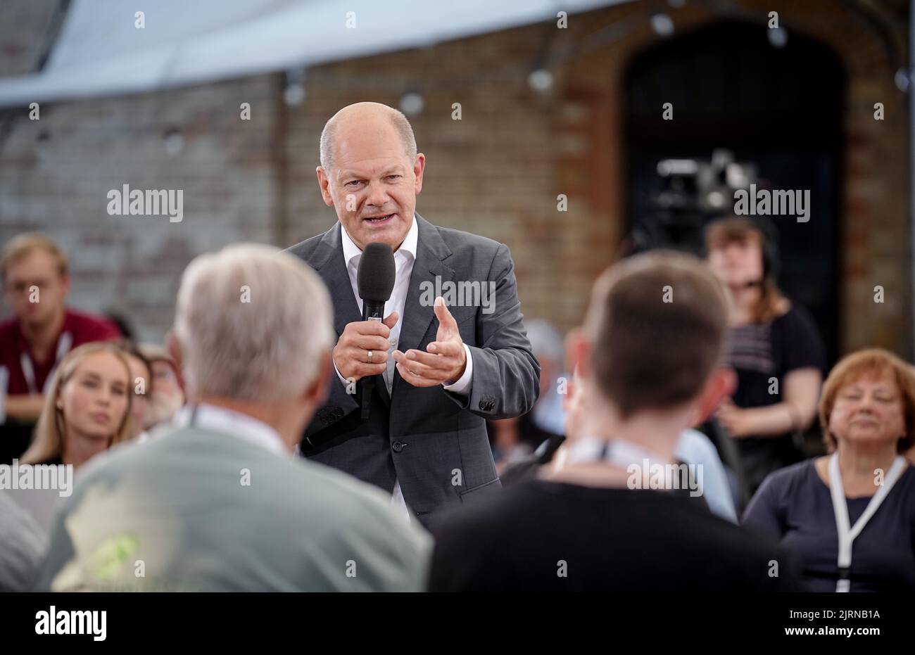 Magdeburg, Germany. 25th Aug, 2022. Chancellor Olaf Scholz (SPD) talks ...