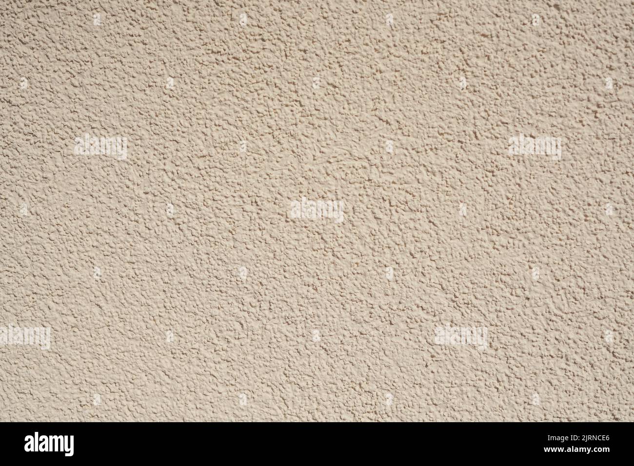 Structural plaster wall in beige color. Creative vintage background ...