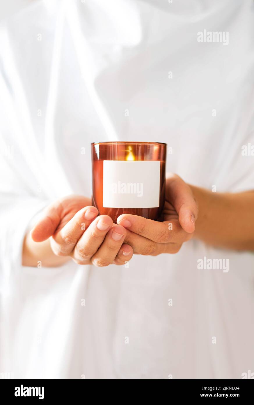 Aromatic candle woman hi-res stock photography and images - Alamy
