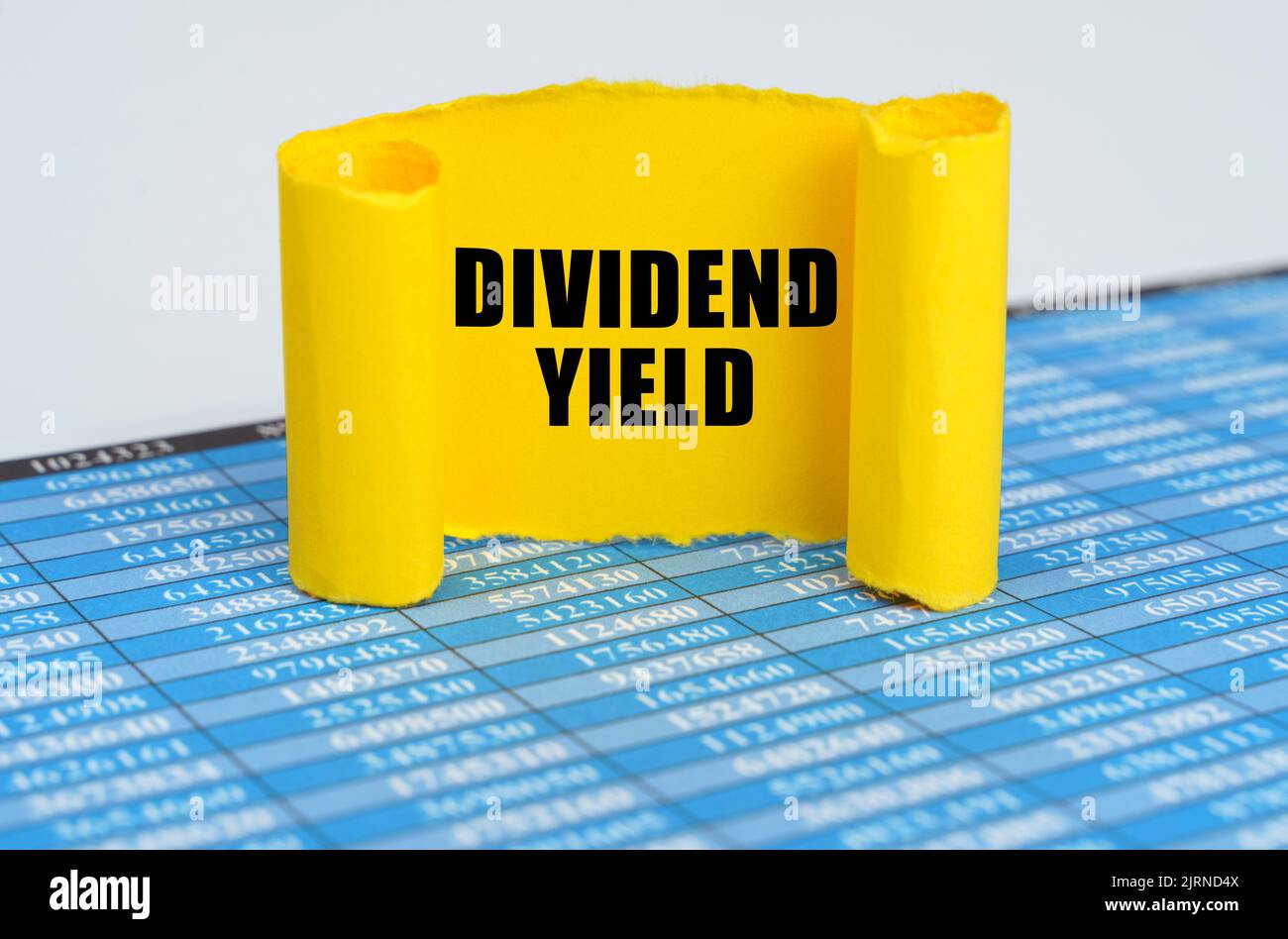 Business concept. On reporting documents, a yellow paper plate with the ...