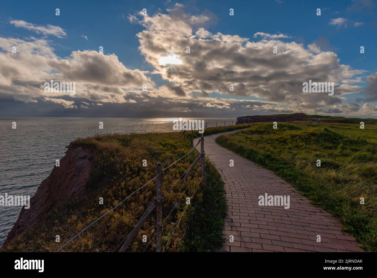 Red sandstone cliff on the high seas island Heligoland, North Sea ...