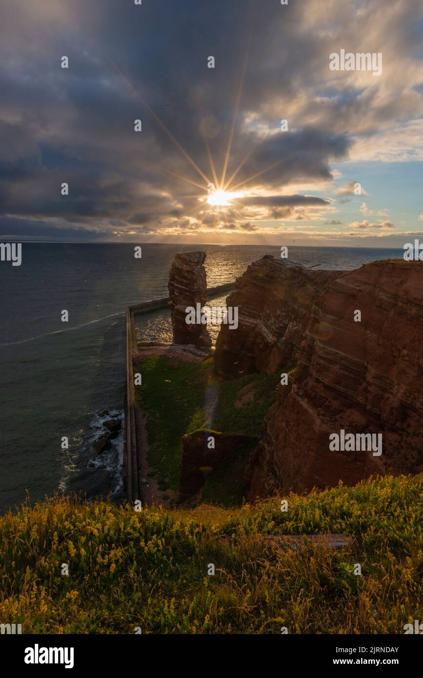 Red sandstone cliff on the high seas island Heligoland, North Sea ...