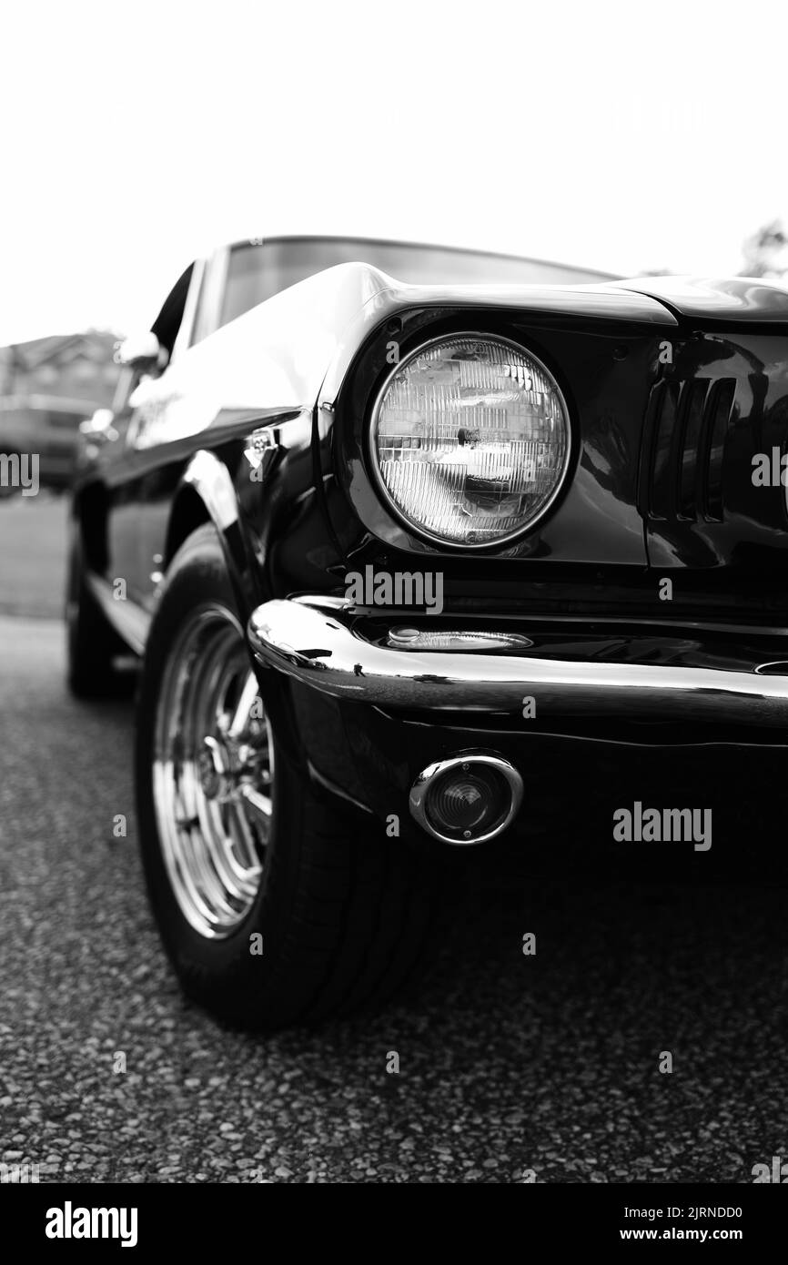 A grayscale of a classic black car parked Stock Photo - Alamy