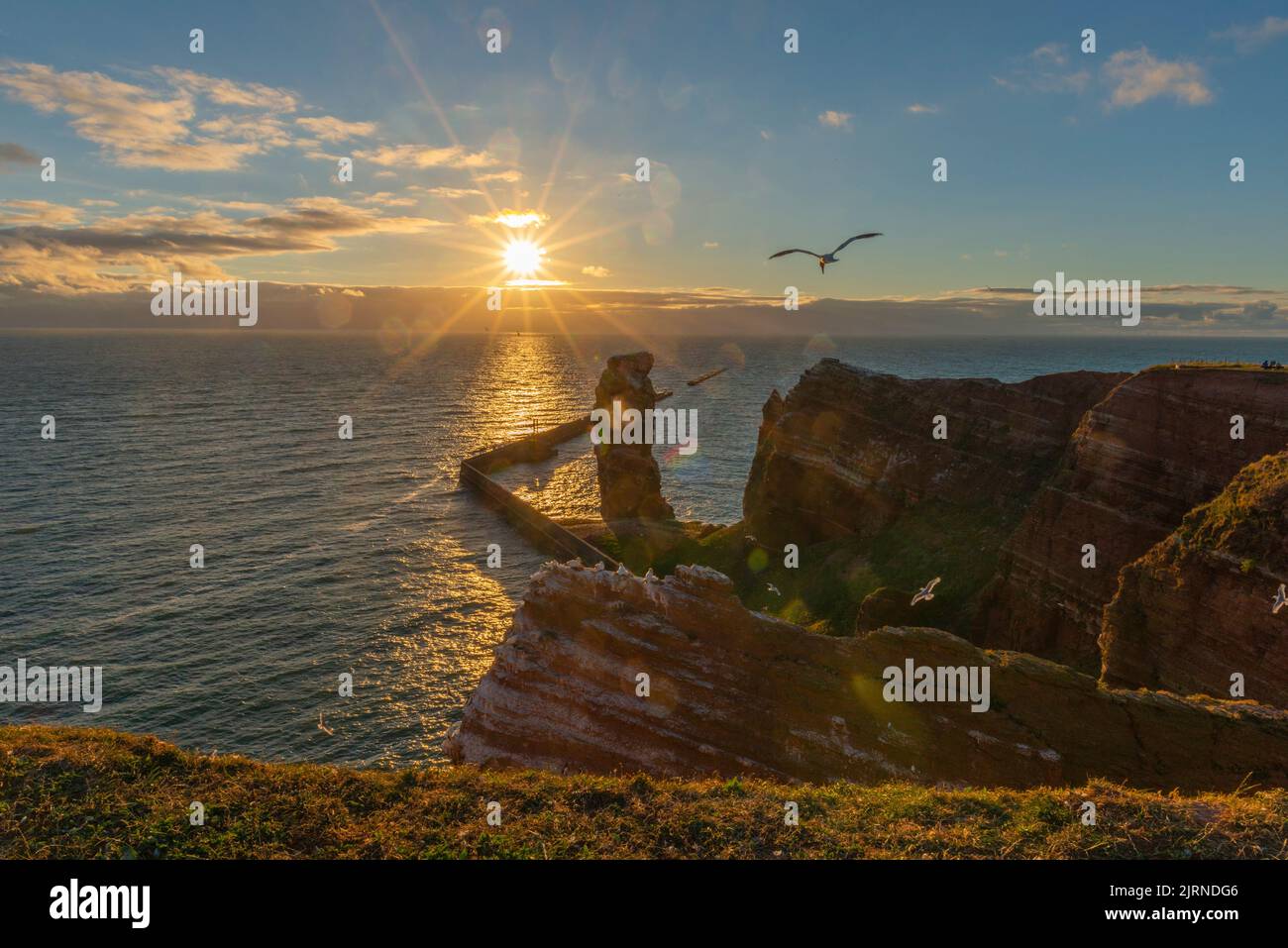 Red sandstone cliff on the high seas island Heligoland, North Sea ...