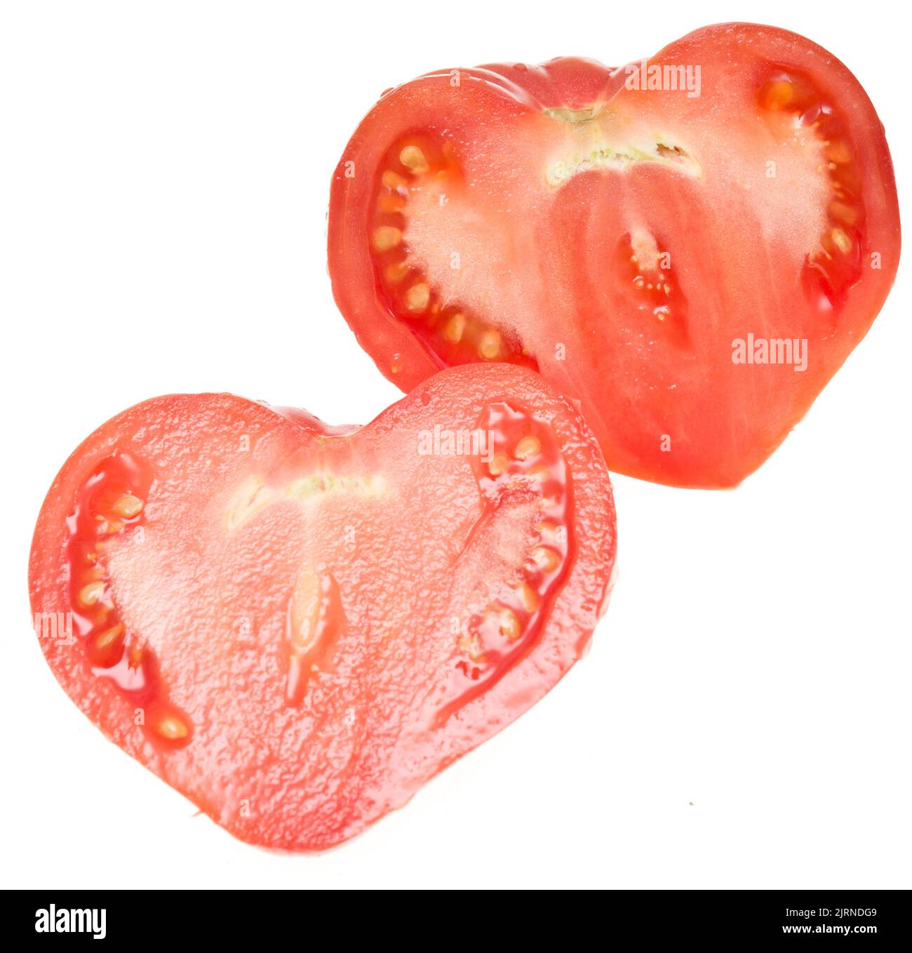Tomato hearts isolated on white background Stock Photo - Alamy