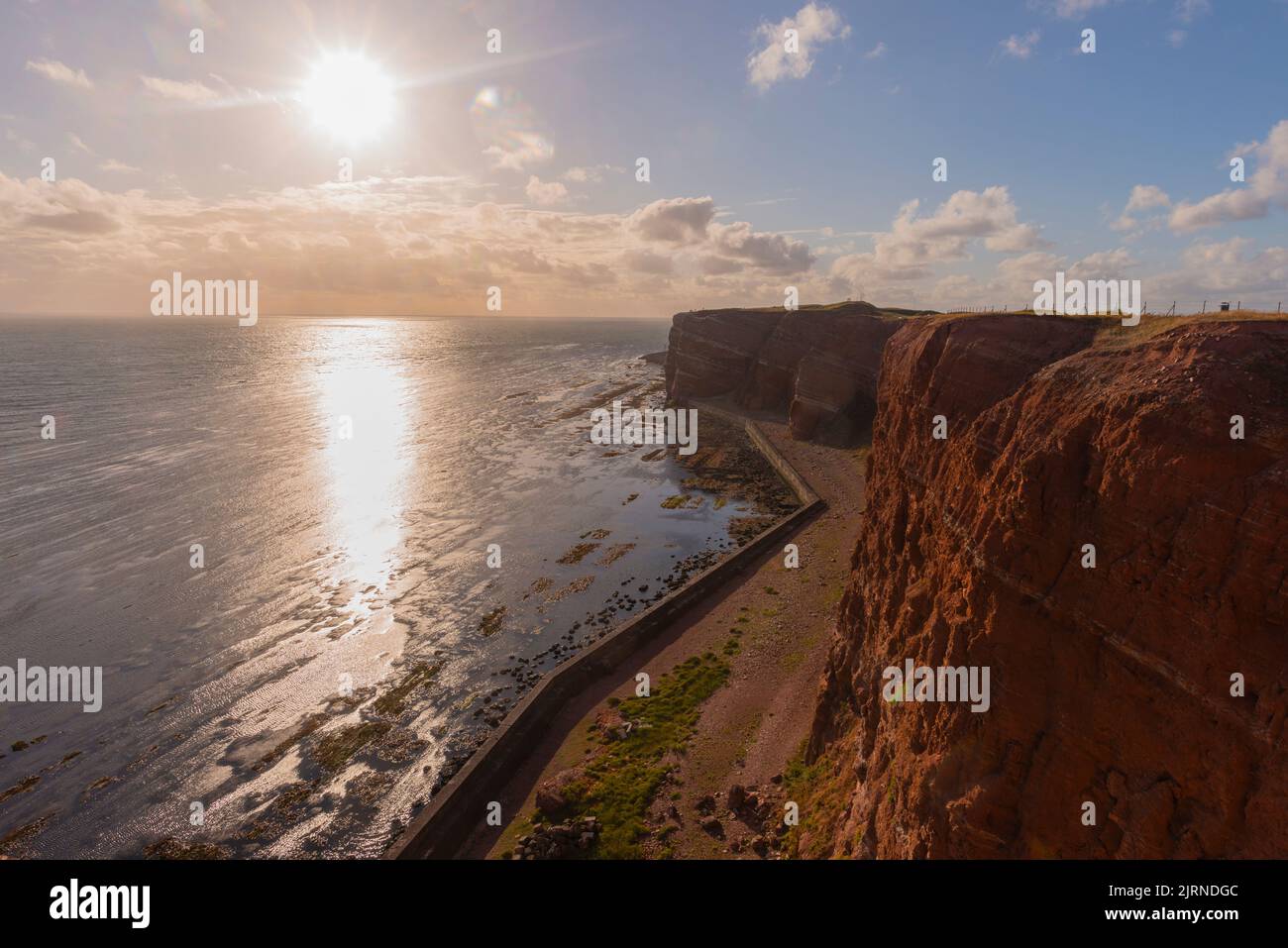 Red sandstone cliff on the high seas island Heligoland, North Sea ...