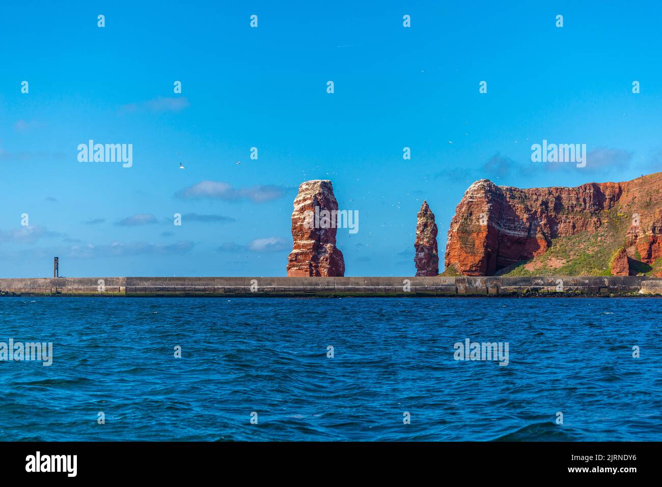 Red sandstone cliff on the high seas island Heligoland, North Sea ...