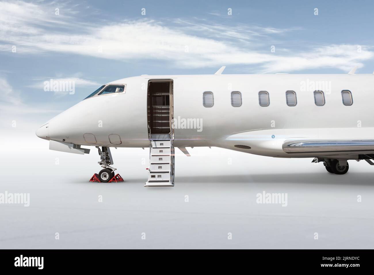 Close-up of the front of the modern white business jet with an opened ...