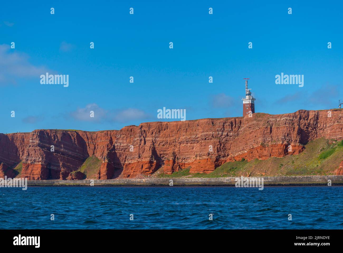Red sandstone cliff on the high seas island Heligoland, North Sea ...