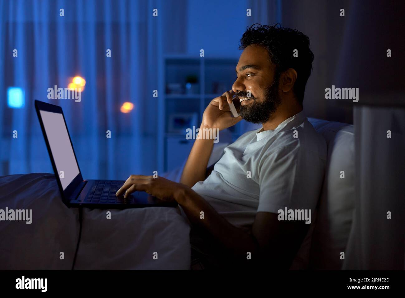 Man phone night bedtime hi-res stock photography and images - Alamy