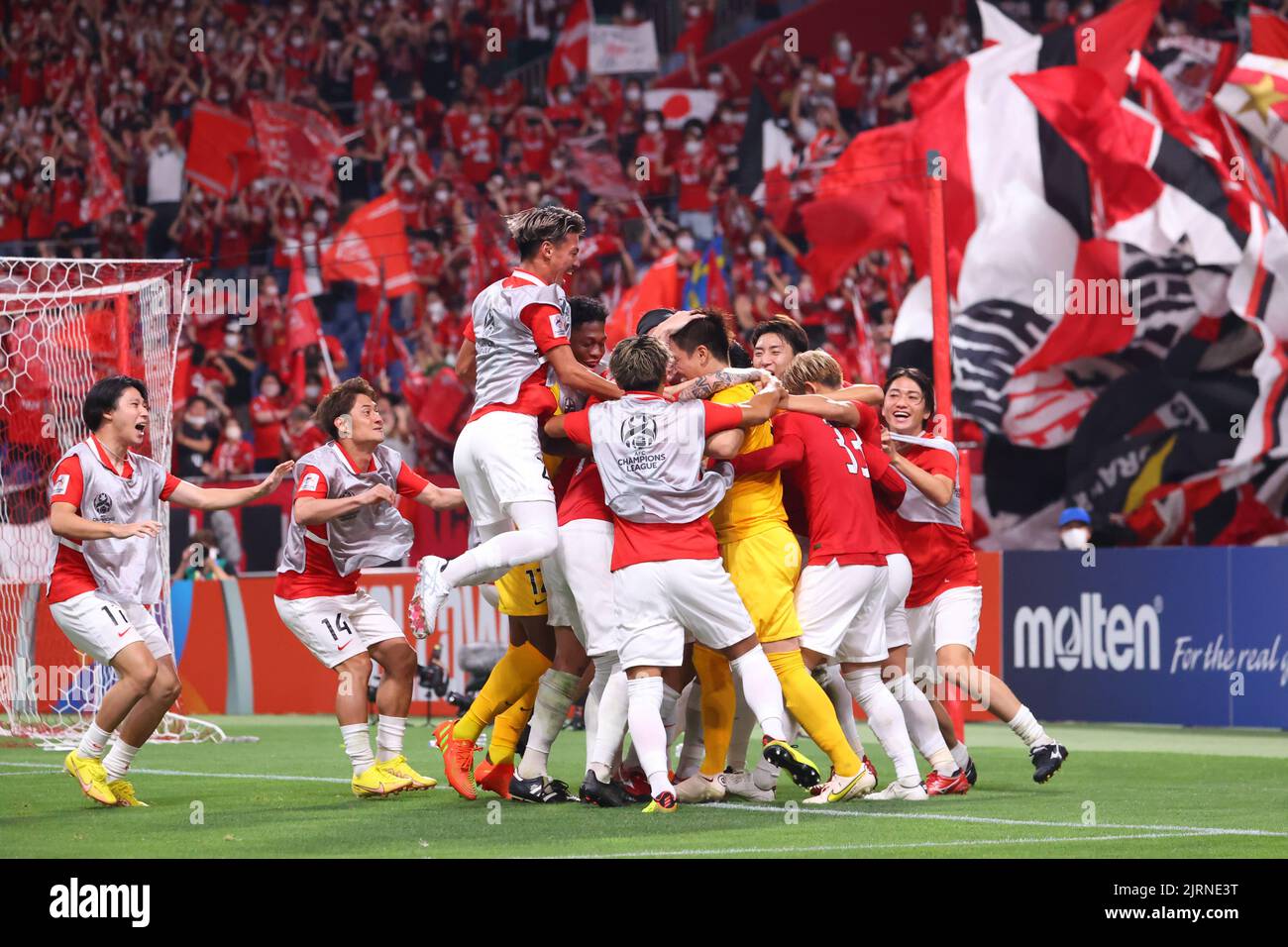Saitama, Japan. 25th Aug, 2022. Urawa Red Diamonds players celebrate ...