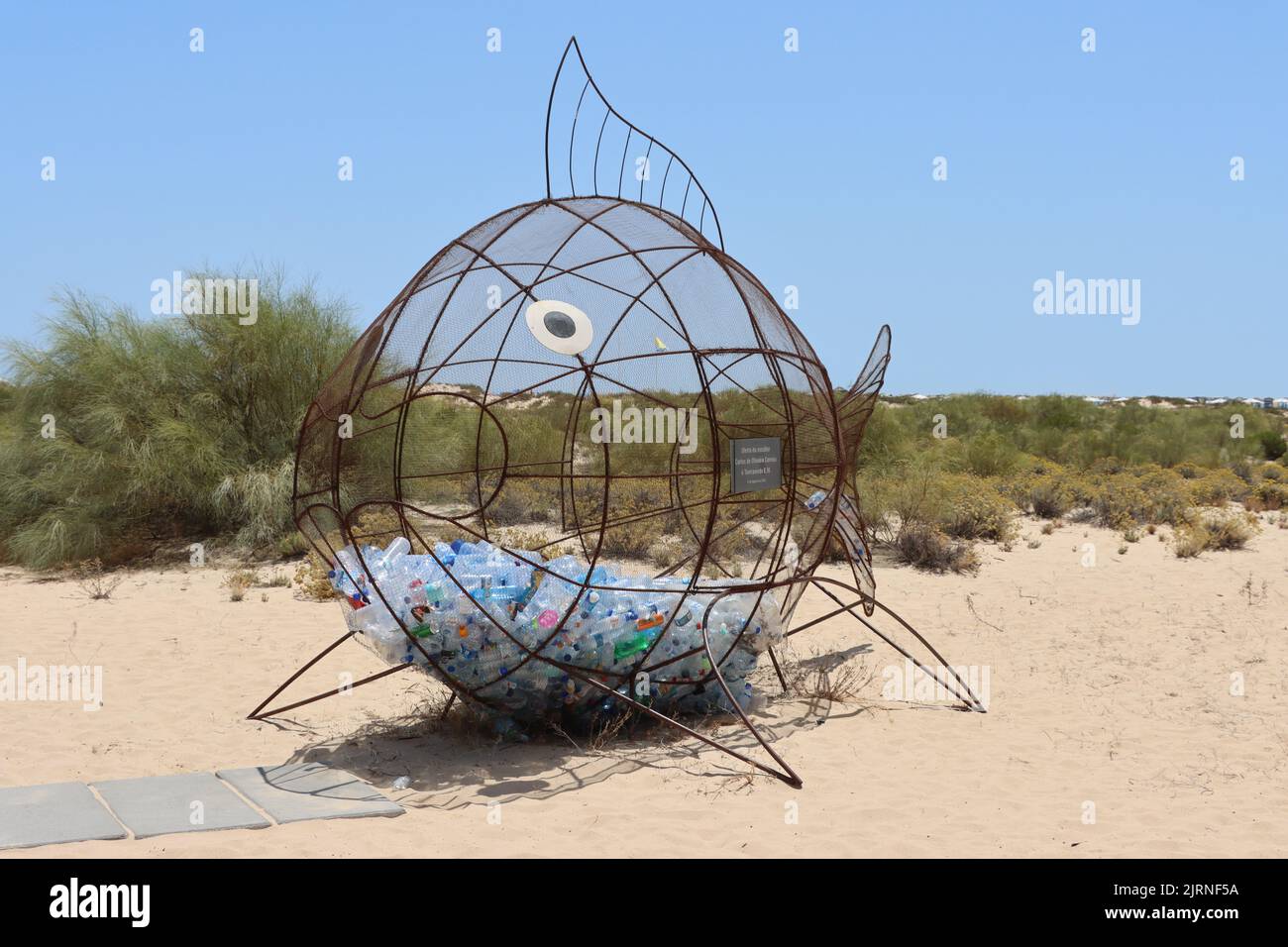 Fish shaped waste bin Stock Photo - Alamy