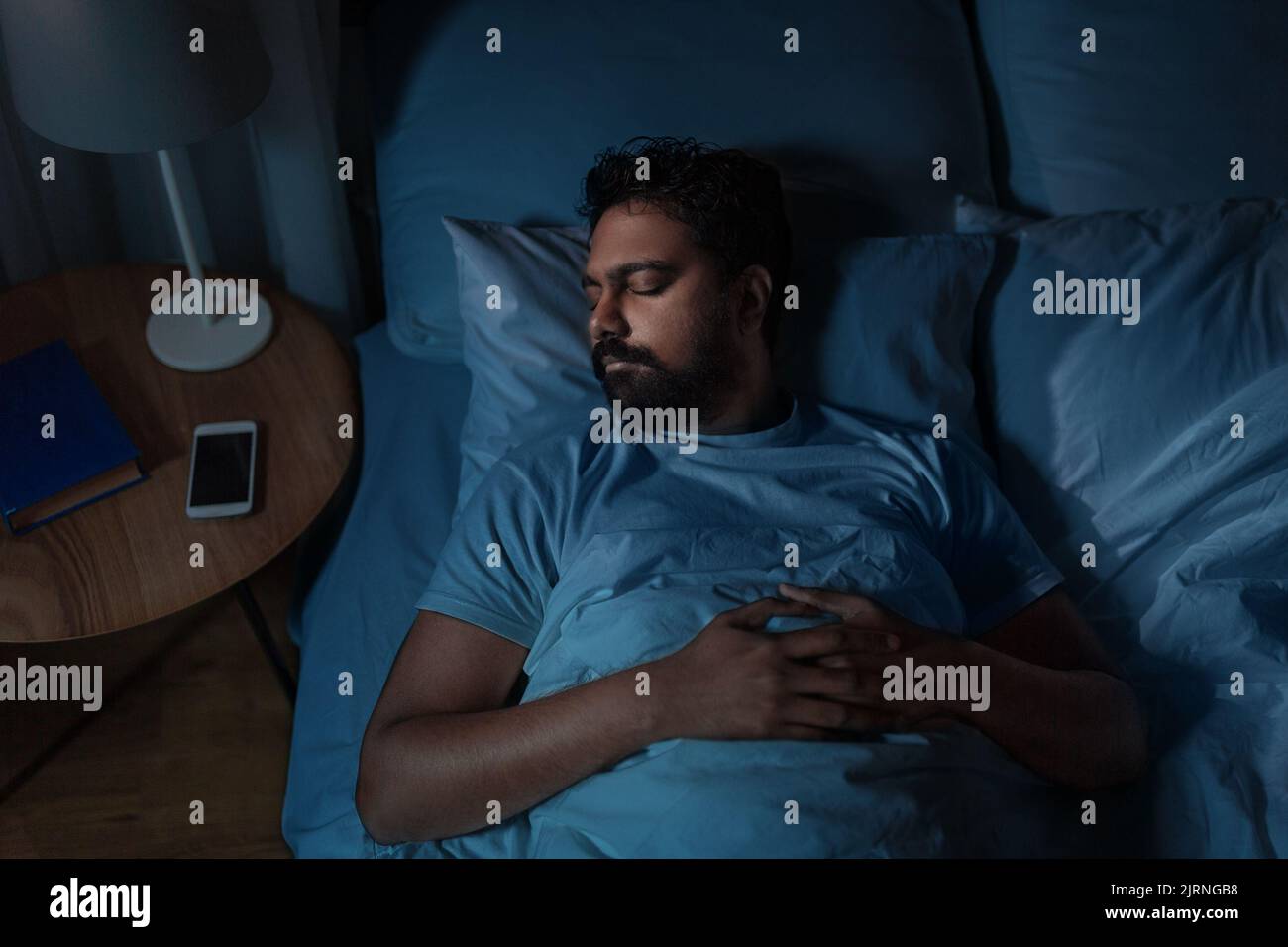 Indian man lying down hi-res stock photography and images - Alamy