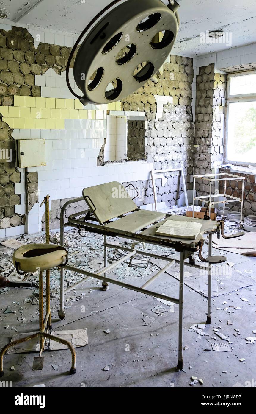 Disintegrating examination room at the Prypiat hospital. Prypiat city ...