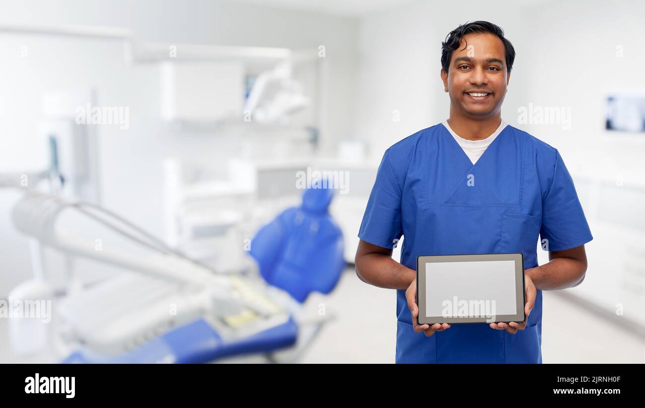 Dentist showing tablet pc hi-res stock photography and images - Alamy